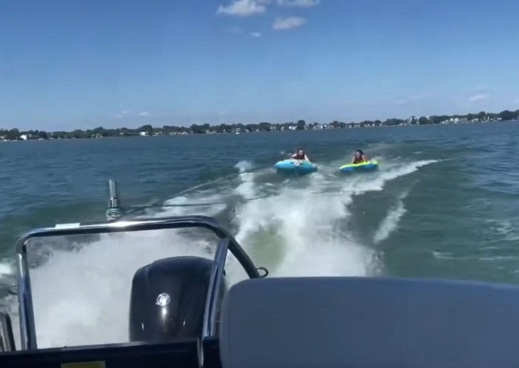 Thrilling Tubing Behind Boat - Unleash the Thrill of Tubing Behind a ...