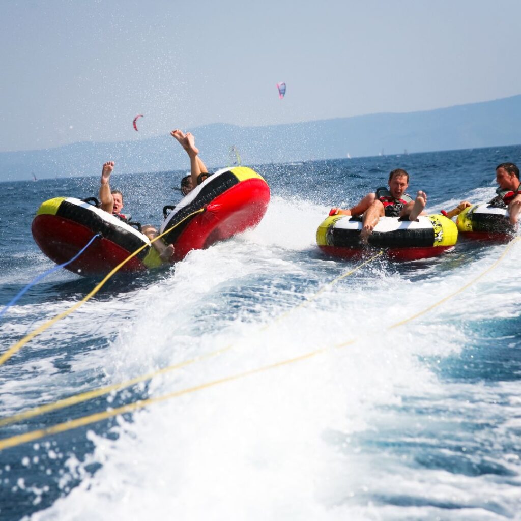 Thrilling Tubing Behind Boat - Unleash the Thrill of Tubing Behind a ...
